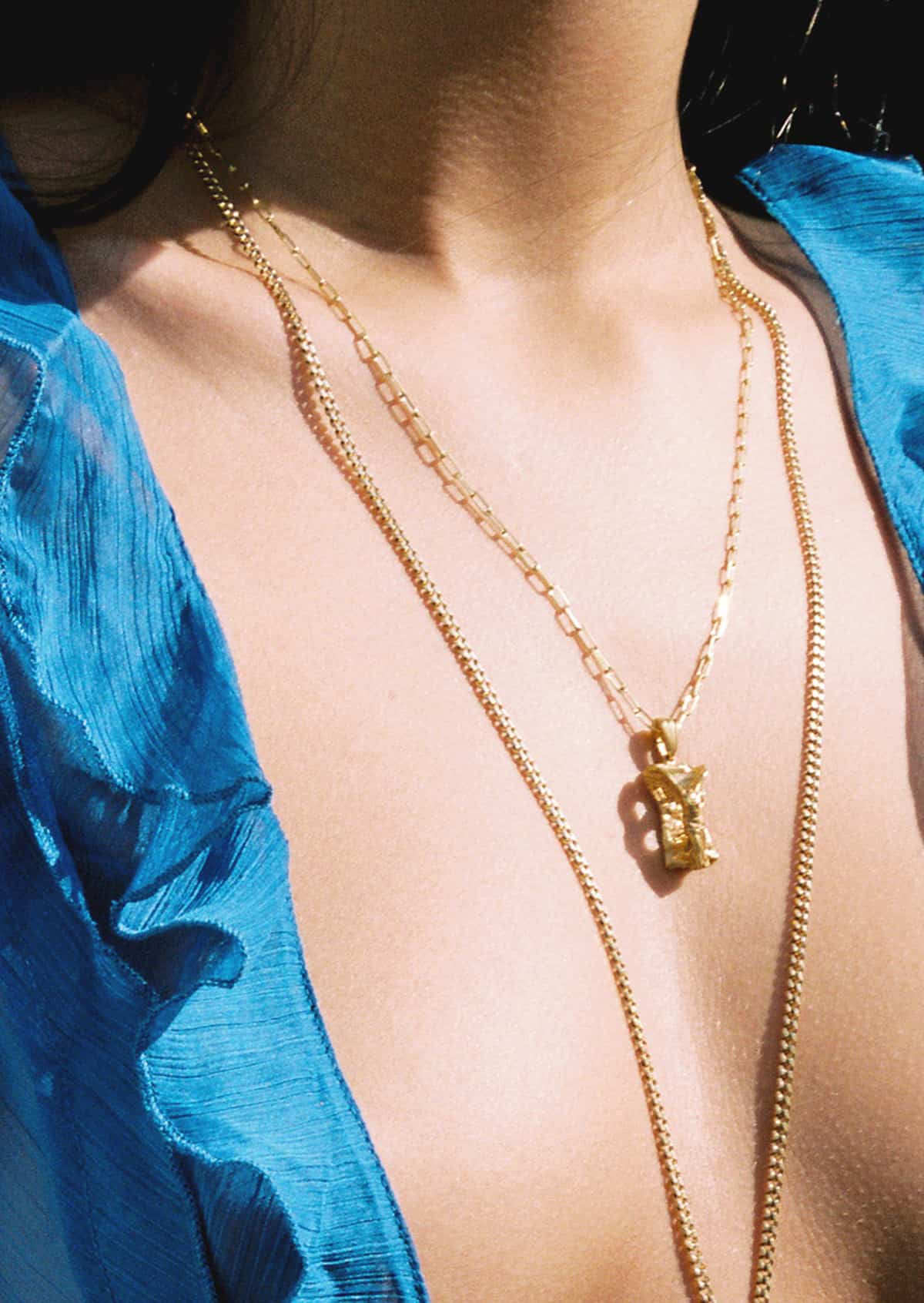 Nike necklace charm store